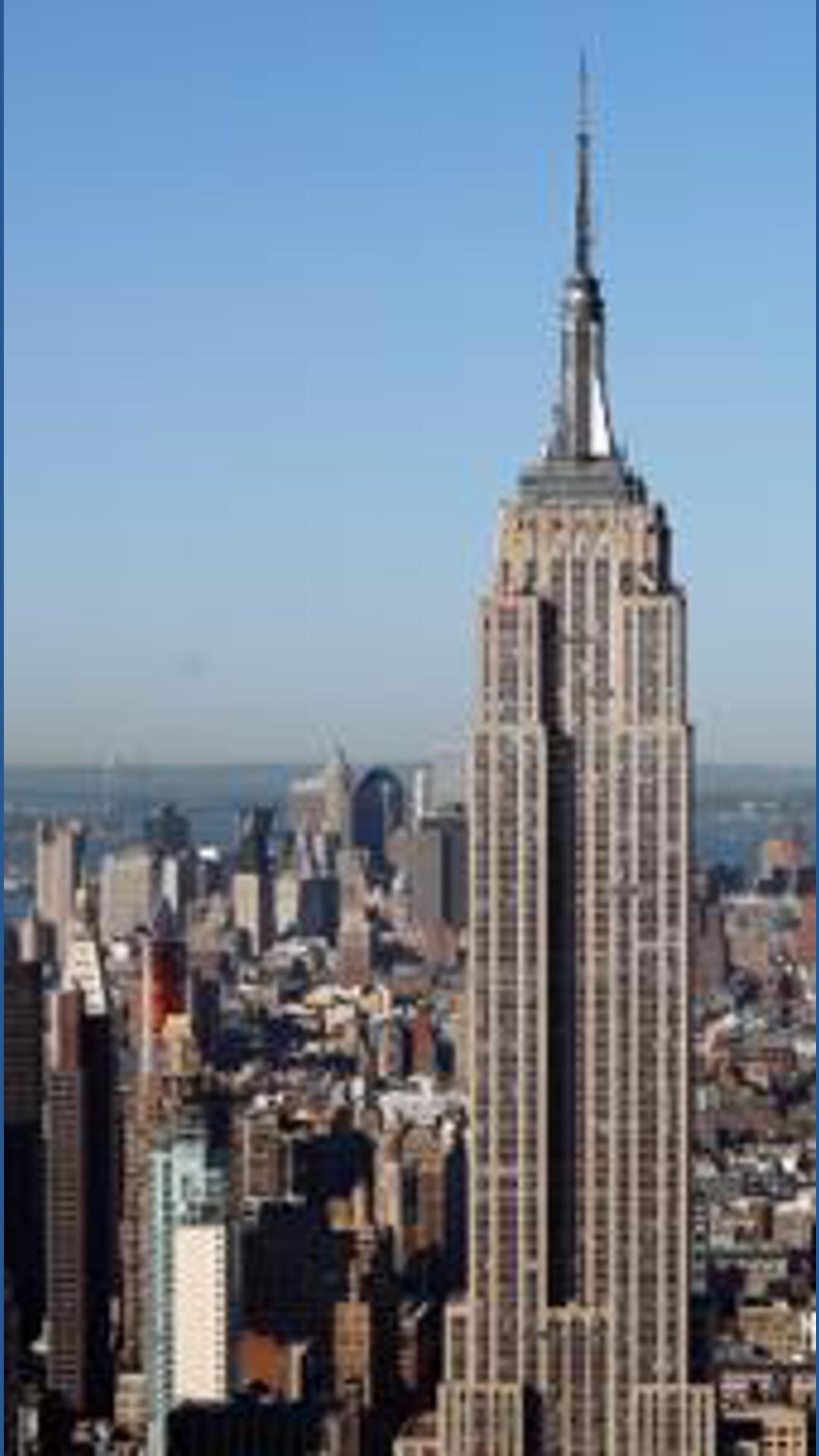 Two people climb to top of NYC's Empire State building | 13wmaz.com