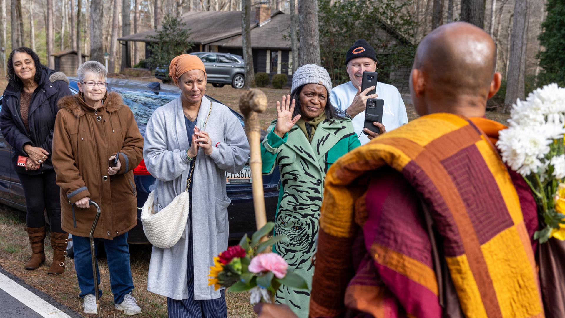 Buddhist monks persist in peace walk from Texas to DC as thousands ...