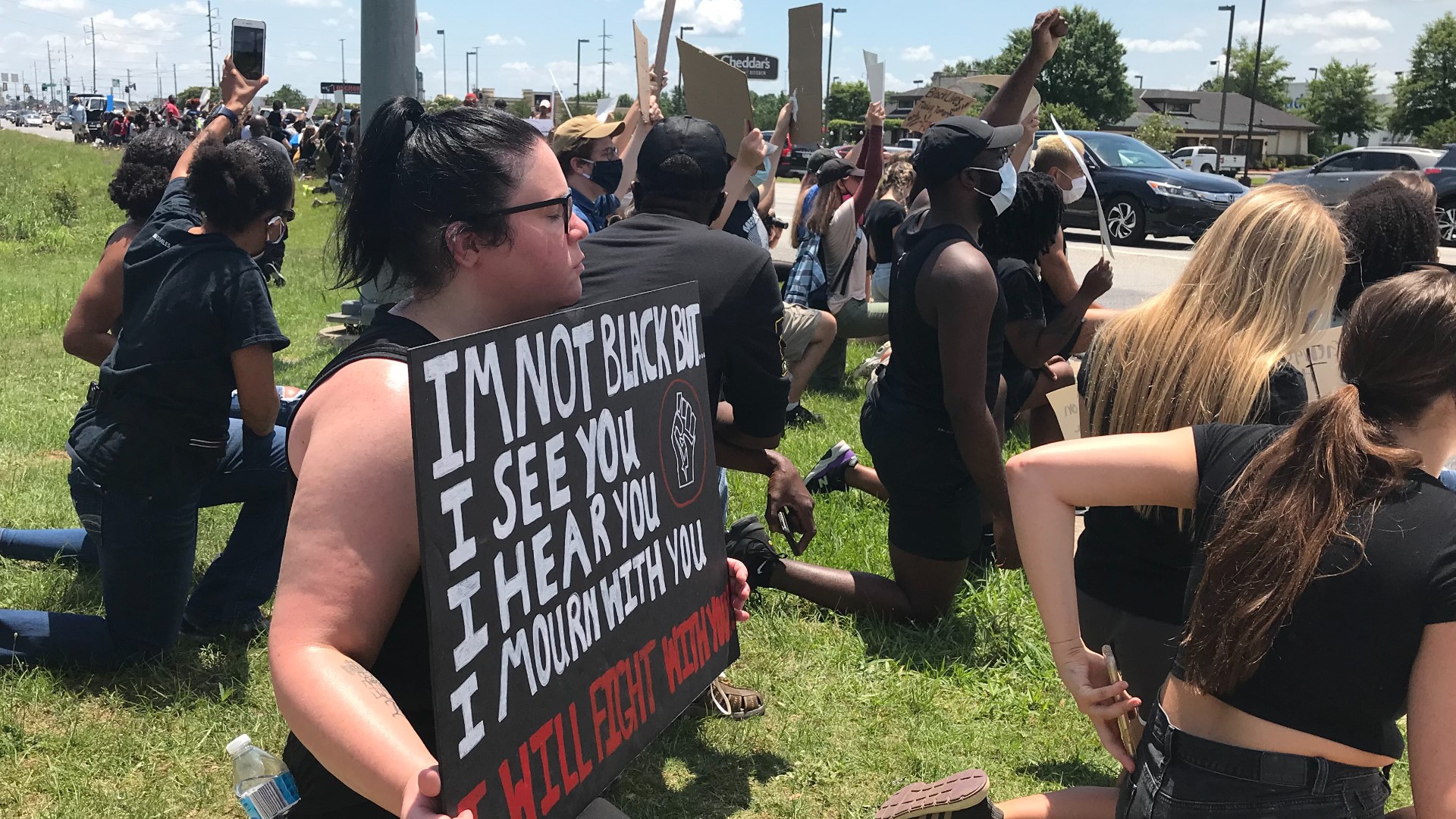 Nearly 200 people participate in peaceful Warner Robins protest ...