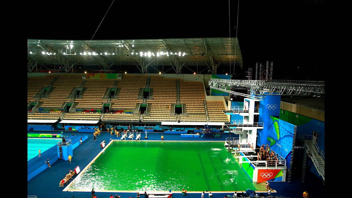 PHOTOS | Olympic diving pool turns bright green | 13wmaz.com