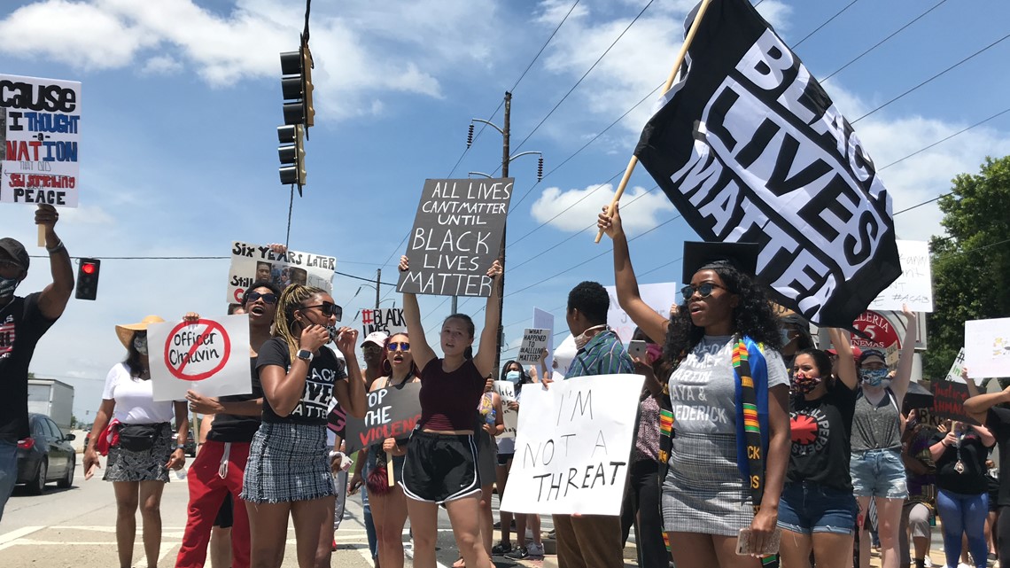 Nearly 200 people participate in peaceful Warner Robins protest ...