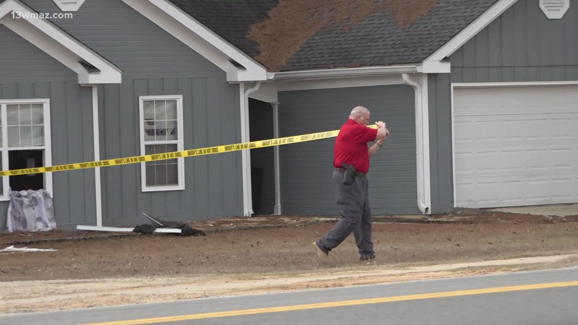 Man in custody after barricaded in home and taking woman hostage ...
