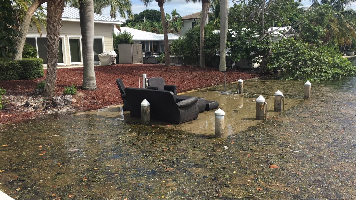 Photos: High tide and storm surge causes flooding near Sarasota ...