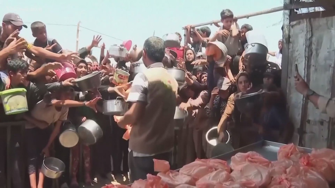 Palestinian's frantically search for food, as Gaza grows closer to ...