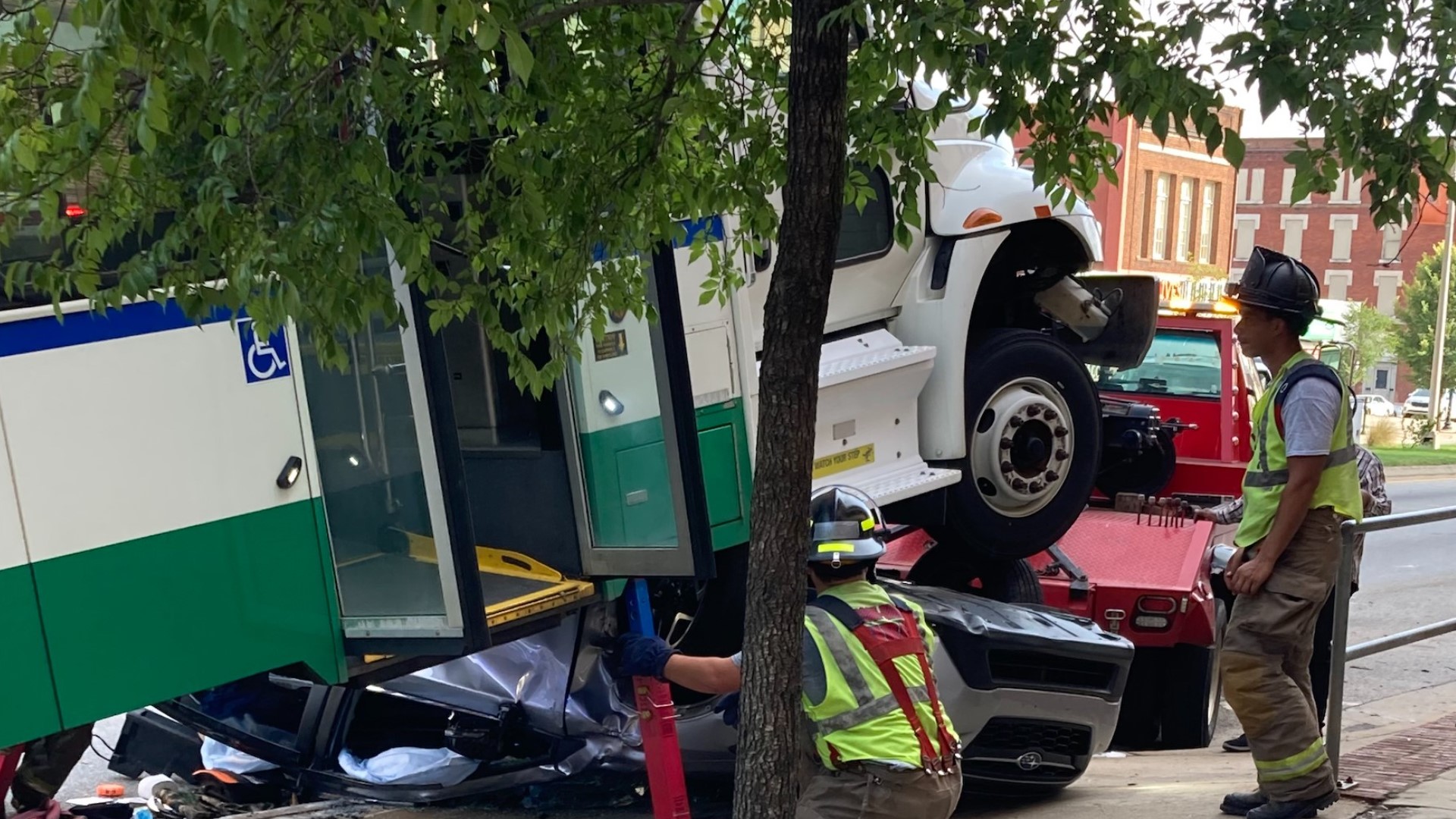 City bus crashes, lands on top of car in Macon | 13wmaz.com