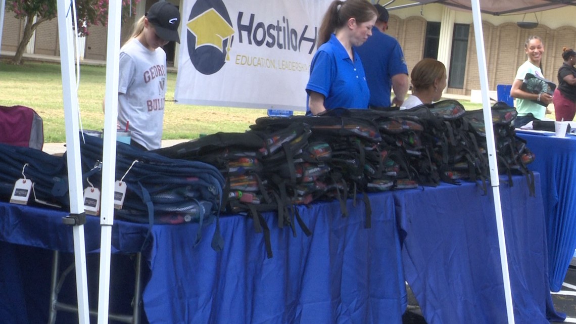 Mike Hostilo Law Firm hosts school supplies giveaway | 13wmaz.com