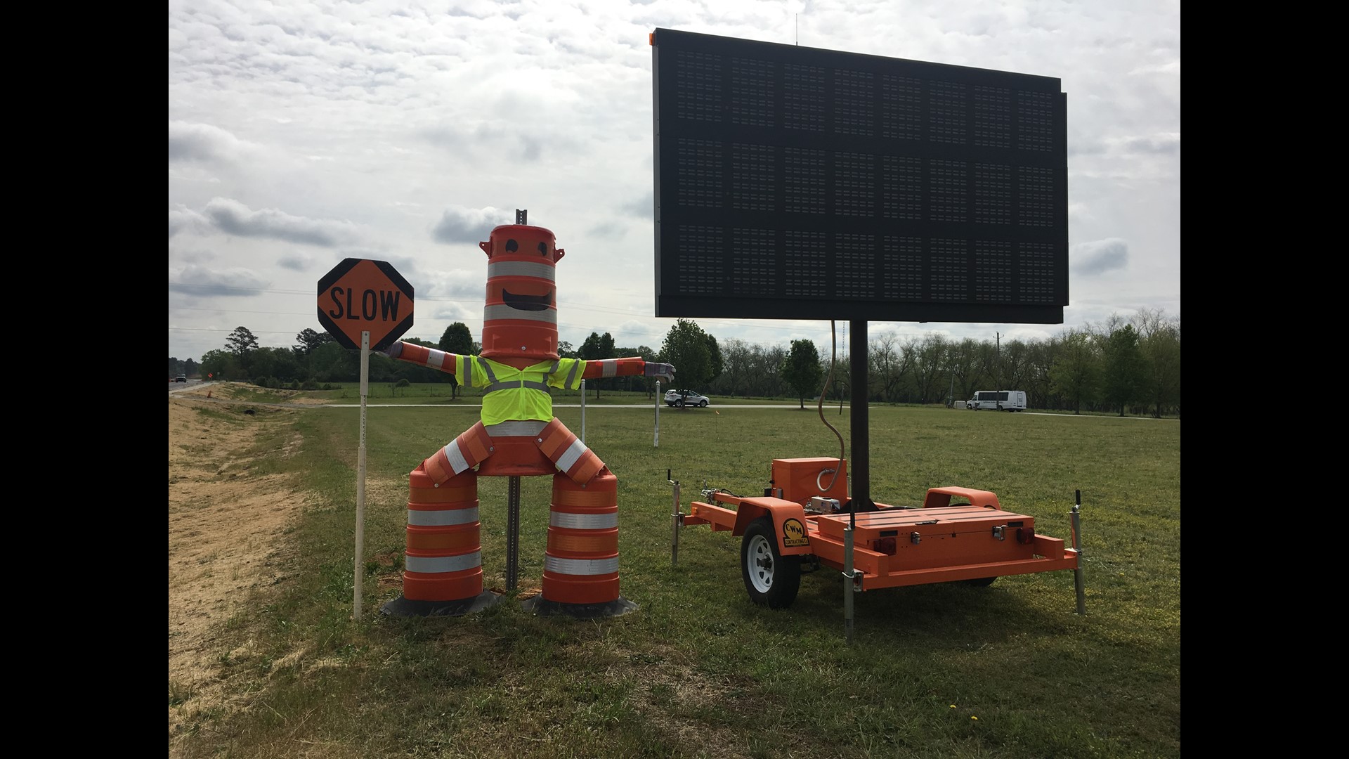 Company builds "Barrel Man" using construction barrels to promote work ...