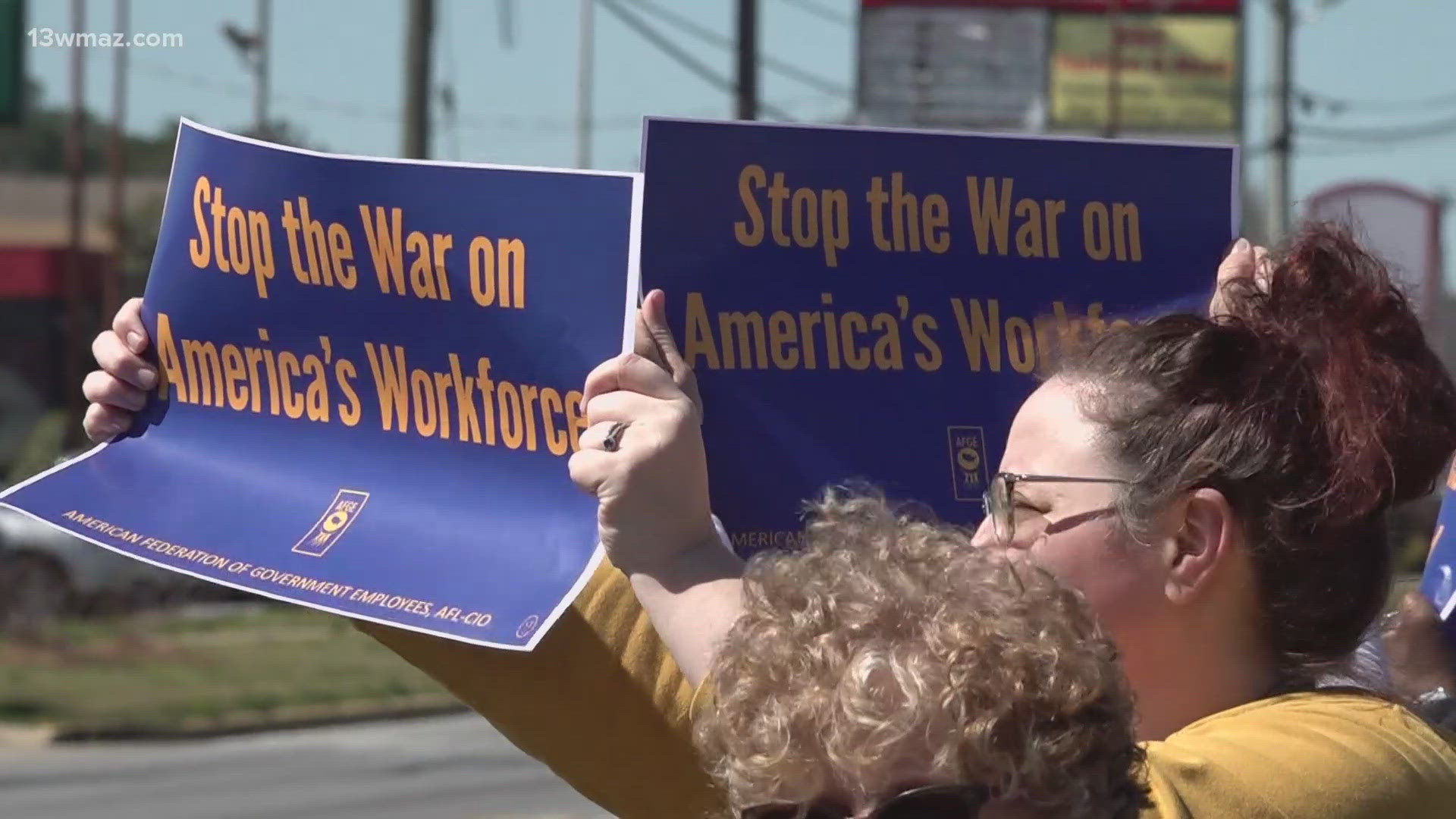 Federal workers rally against job cuts at Robins Air Force Base ...