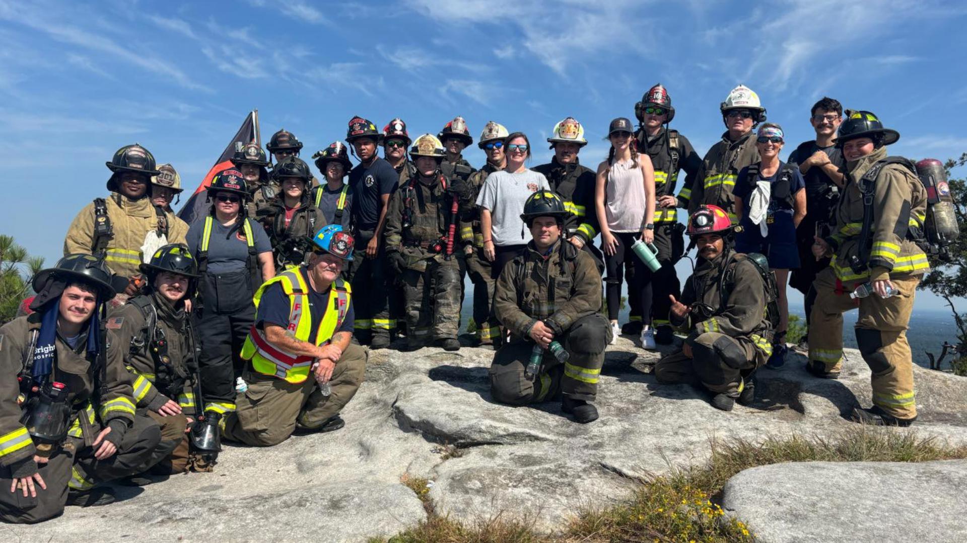 GA firefighters climb Stone Mountain to honor firefighters killed ...