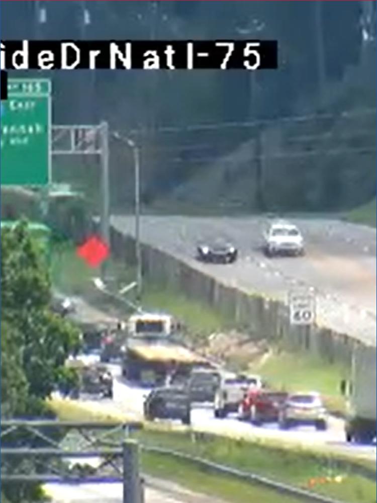 Tractor-trailer rear ends sedan near I-75/I-16 interchange, sends 3 to ...
