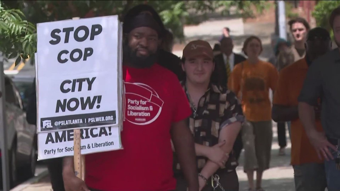 Groups against Cop City protest Falcons outside stadium at game ...