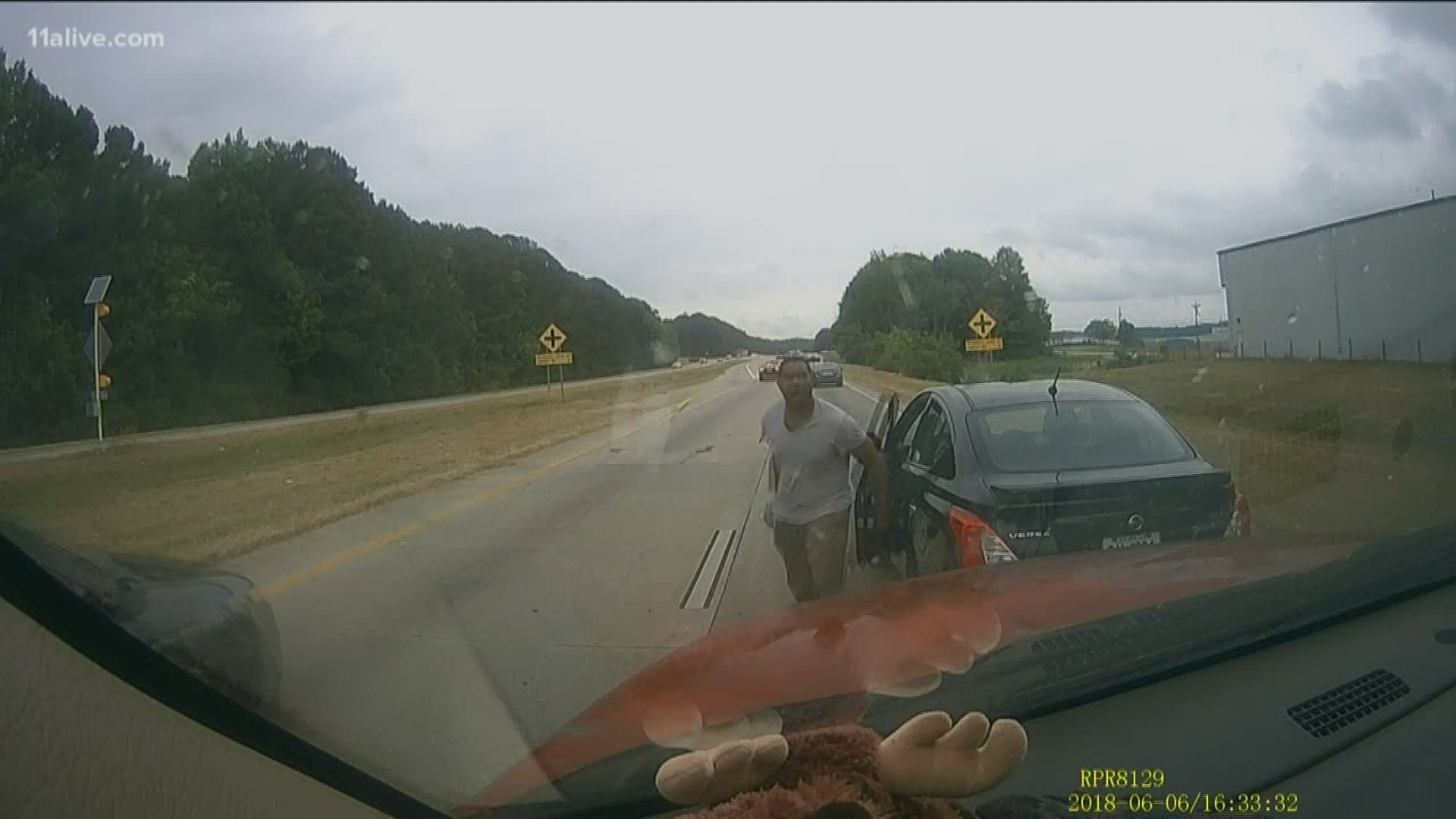 Dashcam Video Man Dragged By Car Down Road In A Headlock